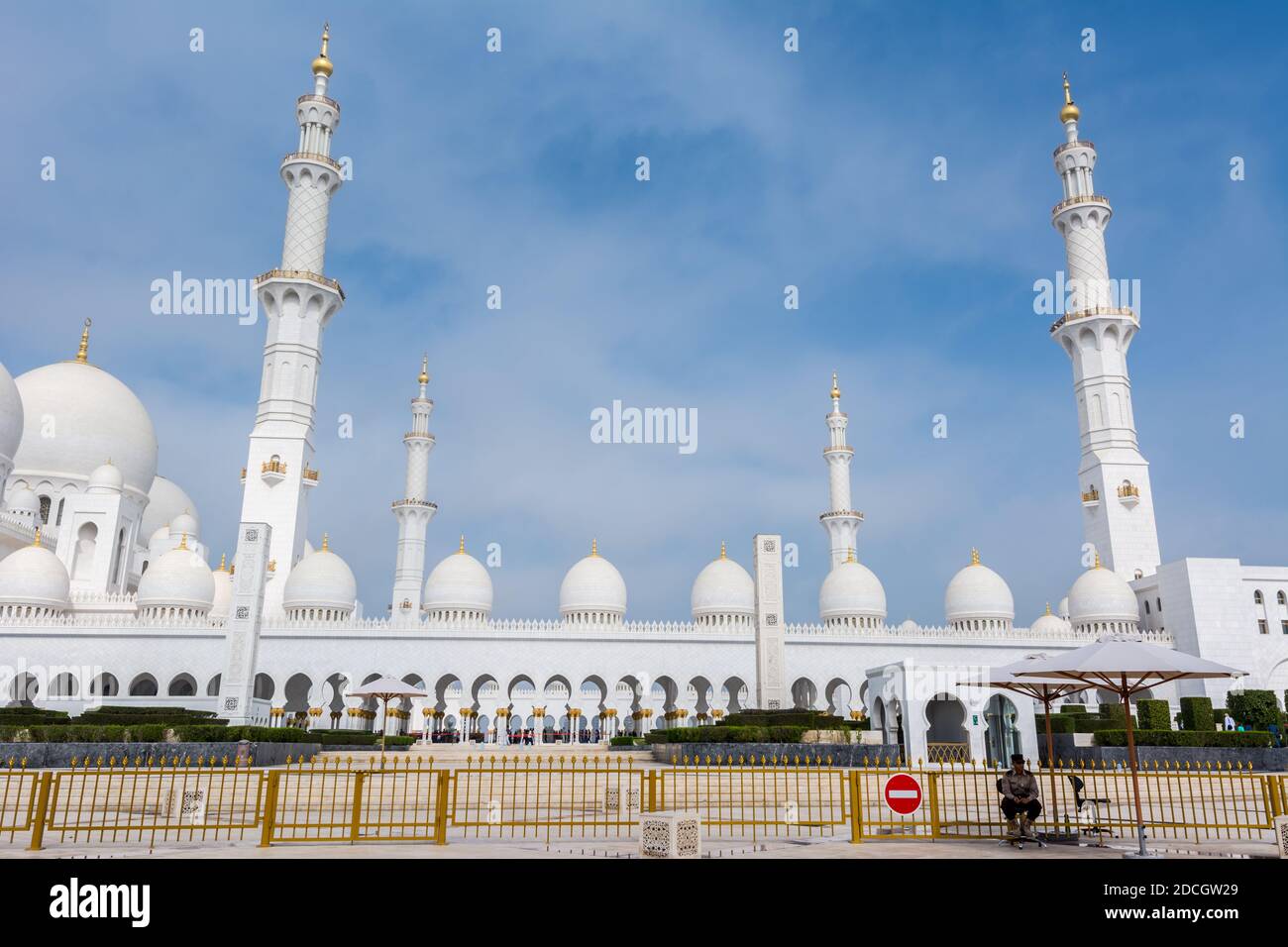 White Minaret of Grand Mosque against blue sky, also called Sheikh ...