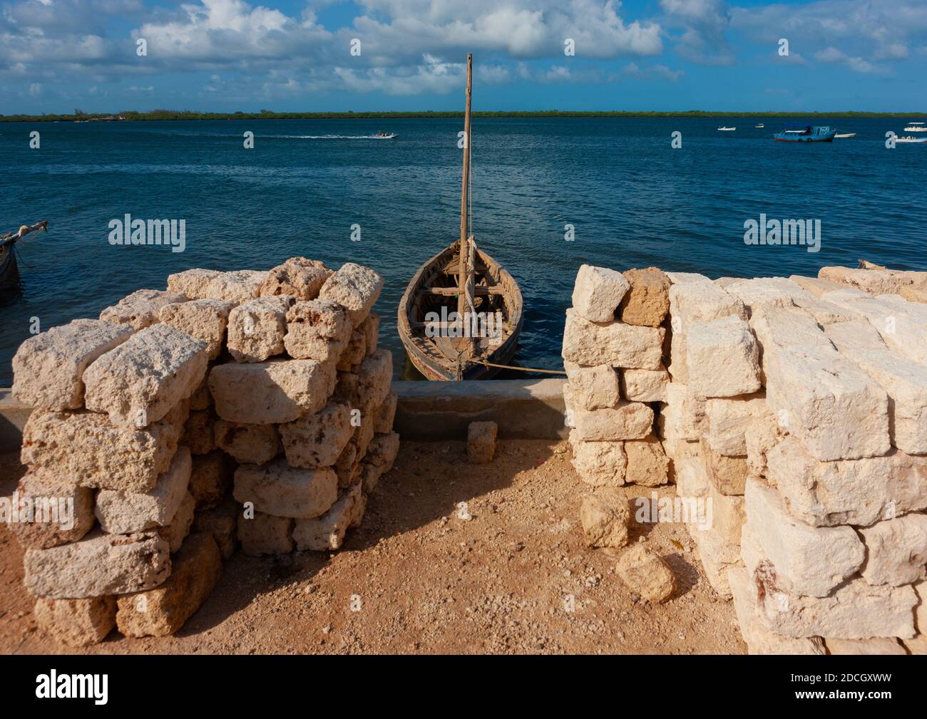 Dhow in the port transporting coral blocks, Lamu County, Lamu, Kenya ...