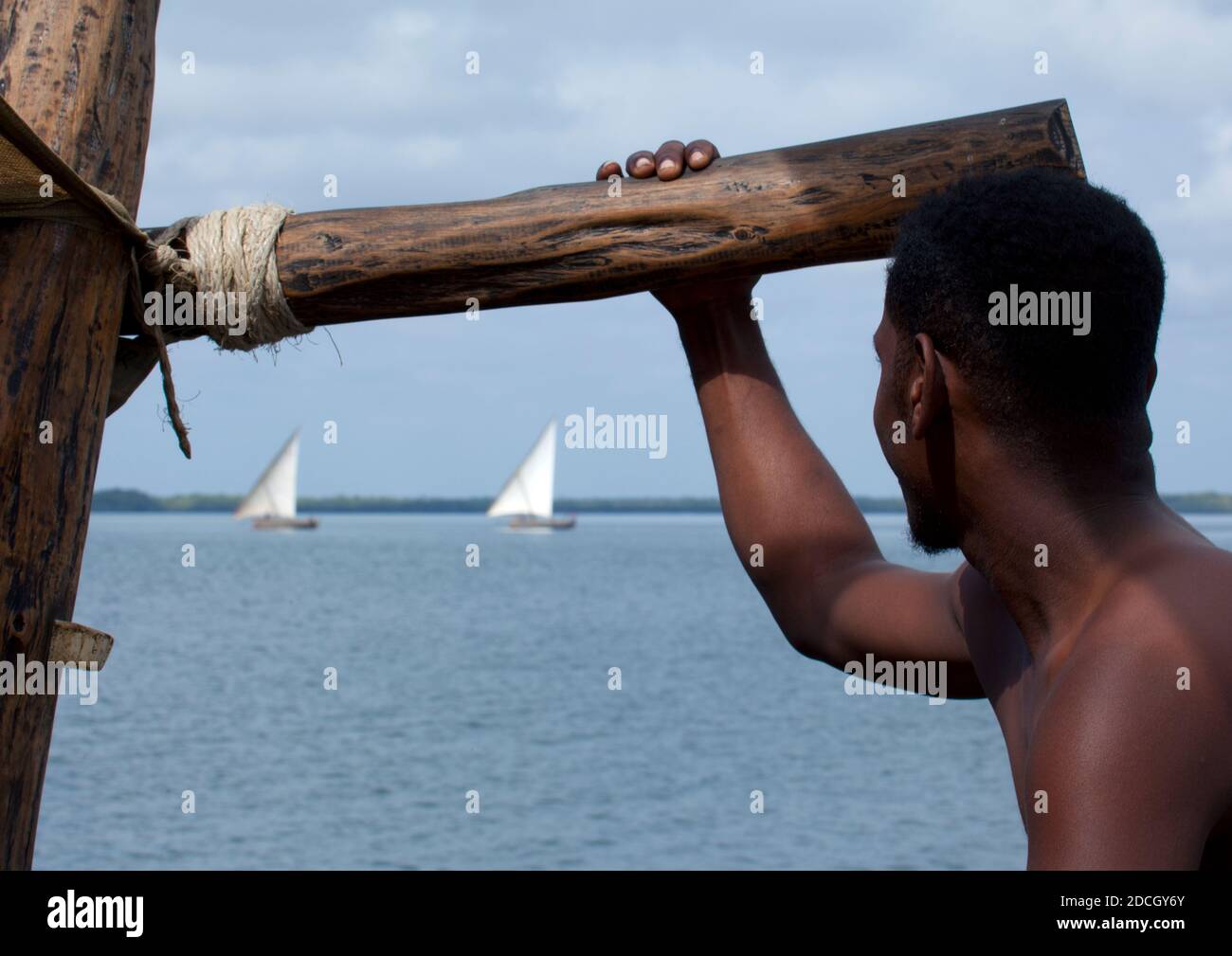 Kenyan man on a dhow sailing, Lamu County, Lamu, Kenya Stock Photo - Alamy