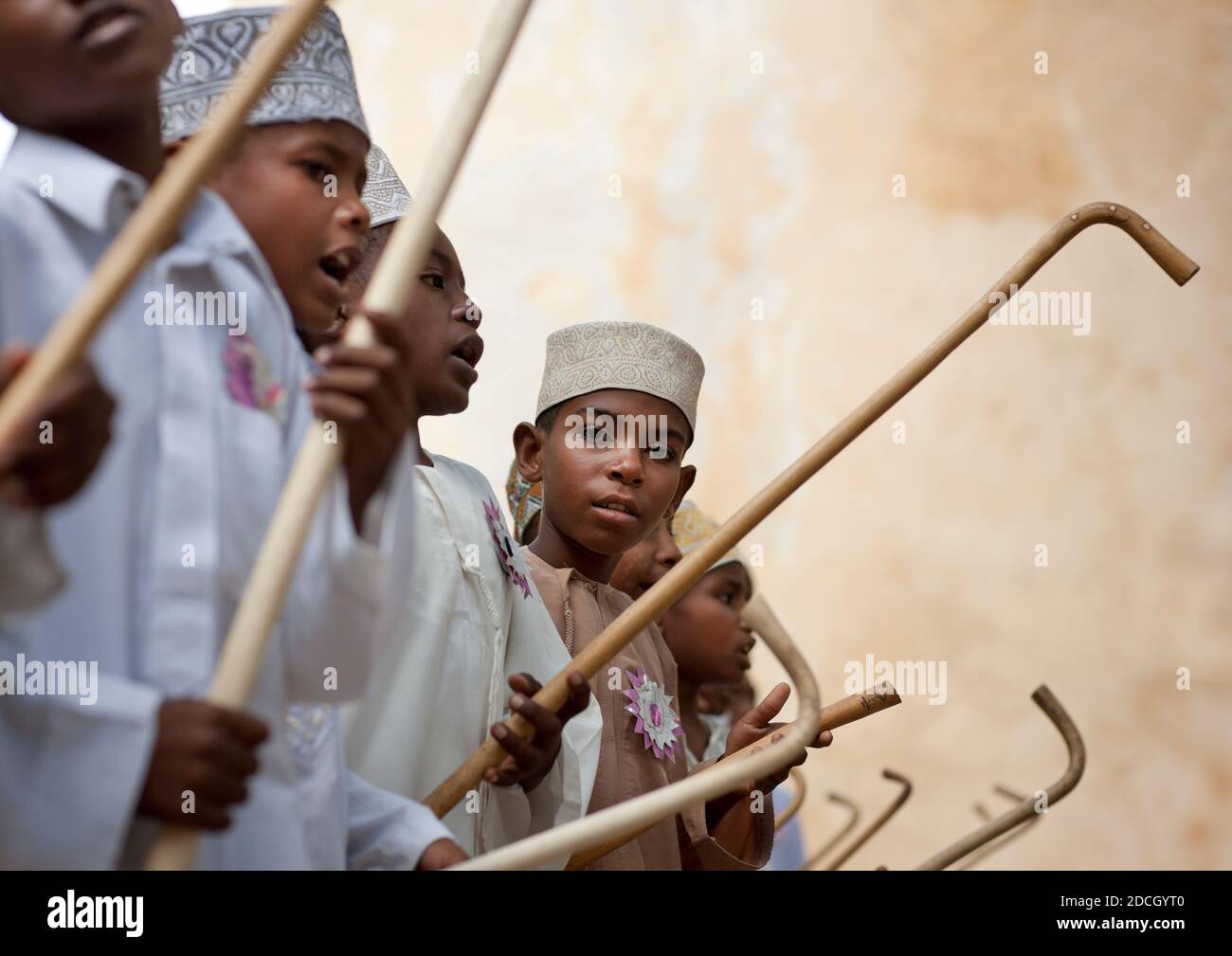 Muslim children dancing with sticks during Maulid festival, Lamu County ...