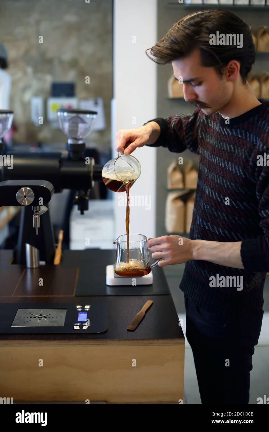 Germany / Berlin /Coffee Style / Barista making filter coffee at ...