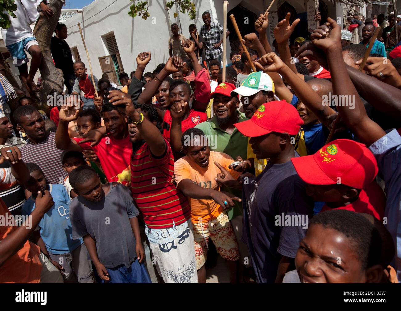 Crowd shouting during donkey riders strike, Lamu County, Lamu, Kenya ...