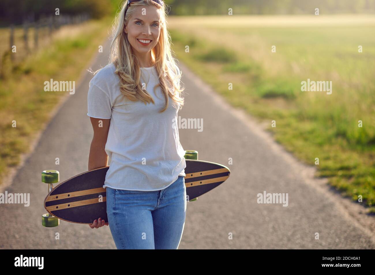 Portrait of a fit beautiful middle-aged woman with an active lifestyle ...
