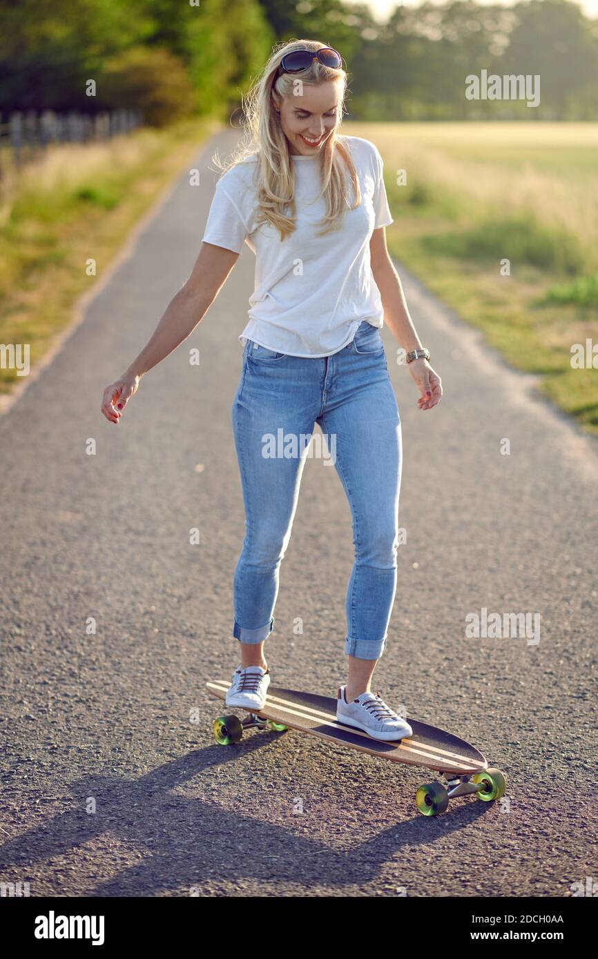 Middle aged woman happy active hi-res stock photography and images - Alamy