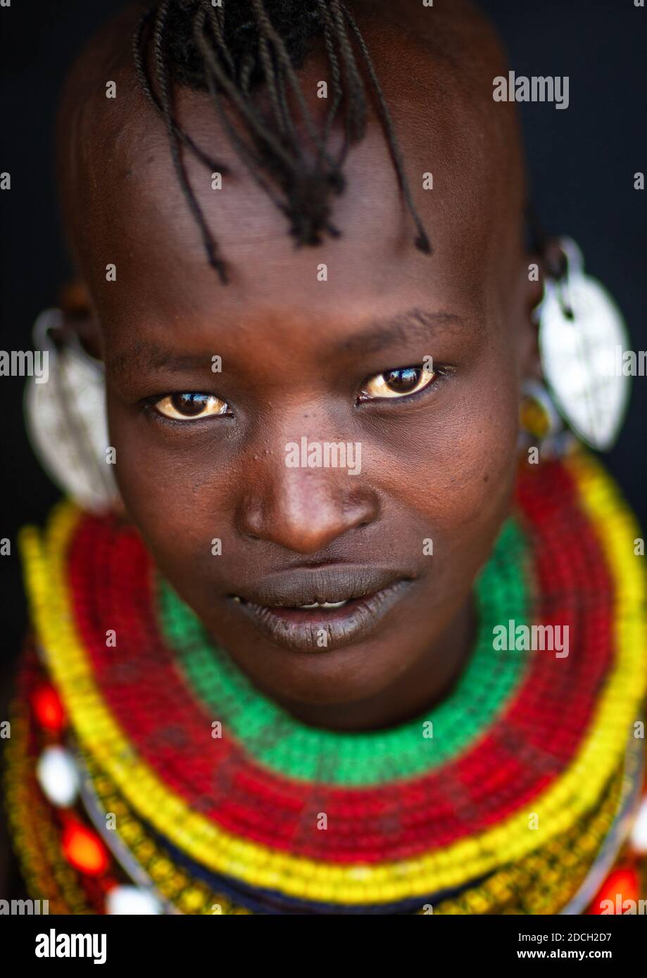 Smiling Turkana tribe woman with necklaces and earrings, Rift Valley ...
