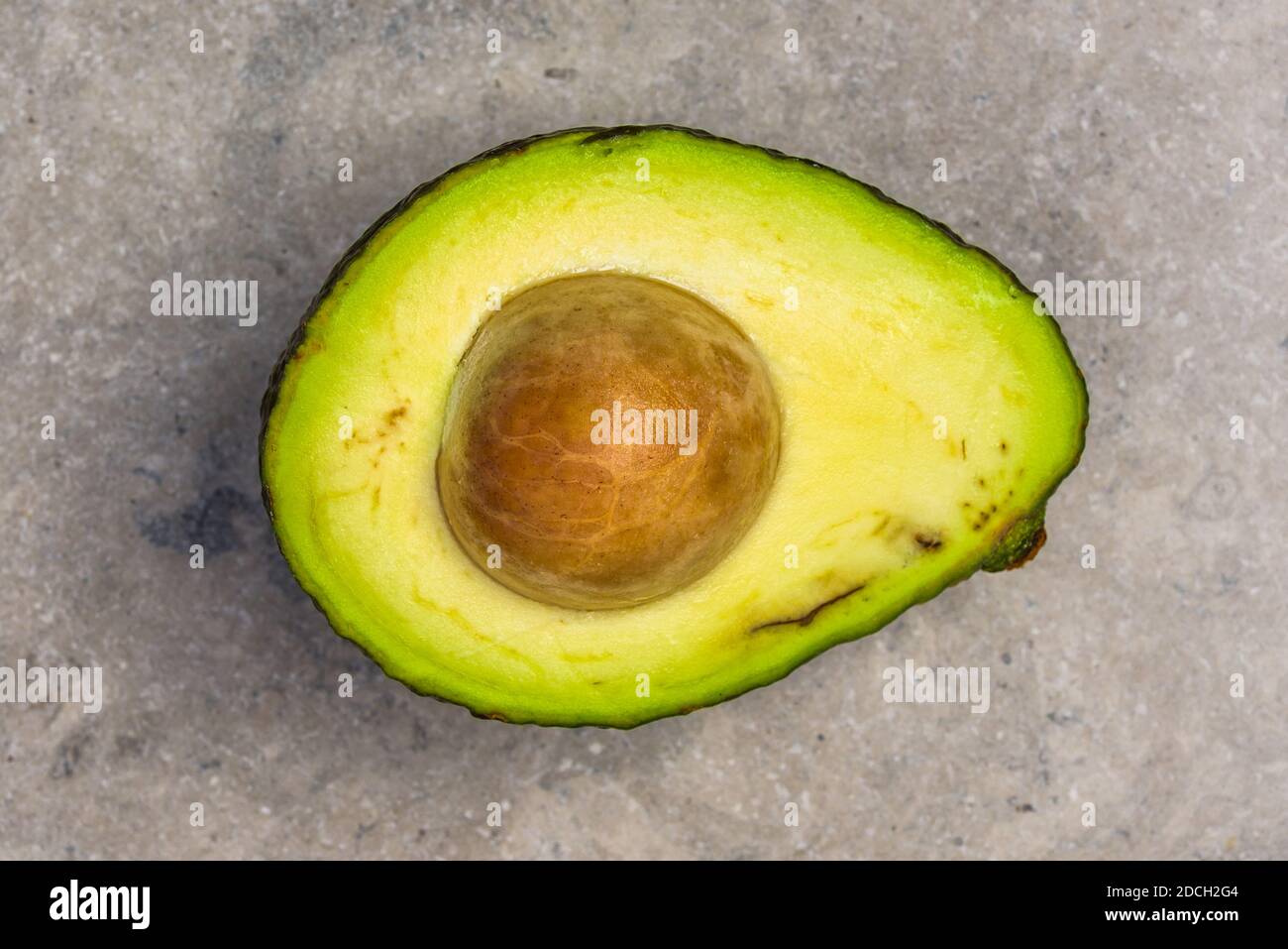 Cut in half avocado hi-res stock photography and images - Alamy