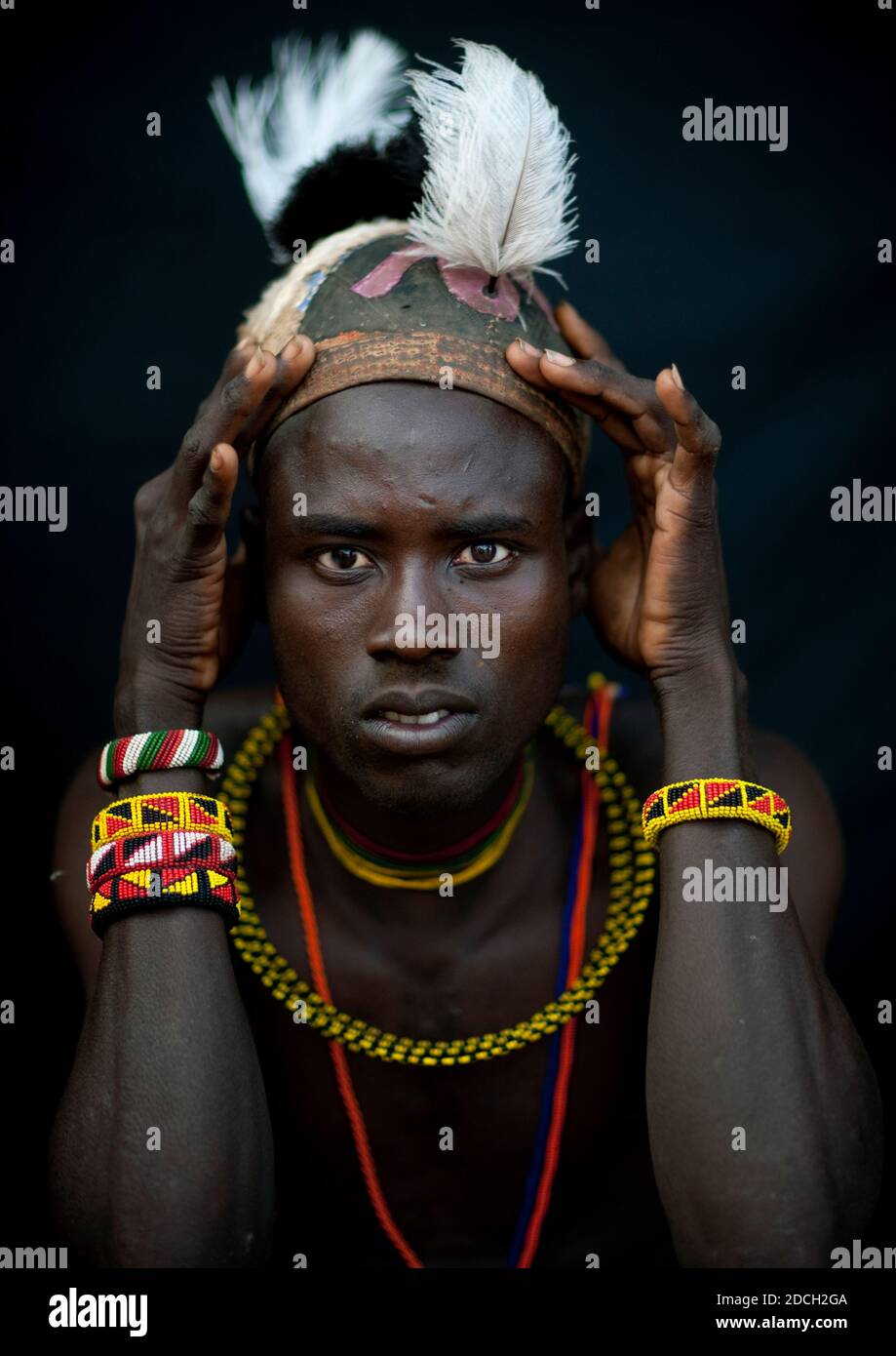 Portrait of a Turkana tribe man with a headwear, Rift Valley Province ...