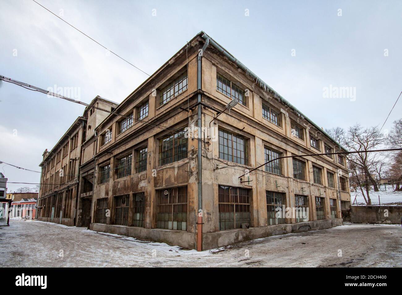 An old decayed industrial building in an industrial district Stock ...