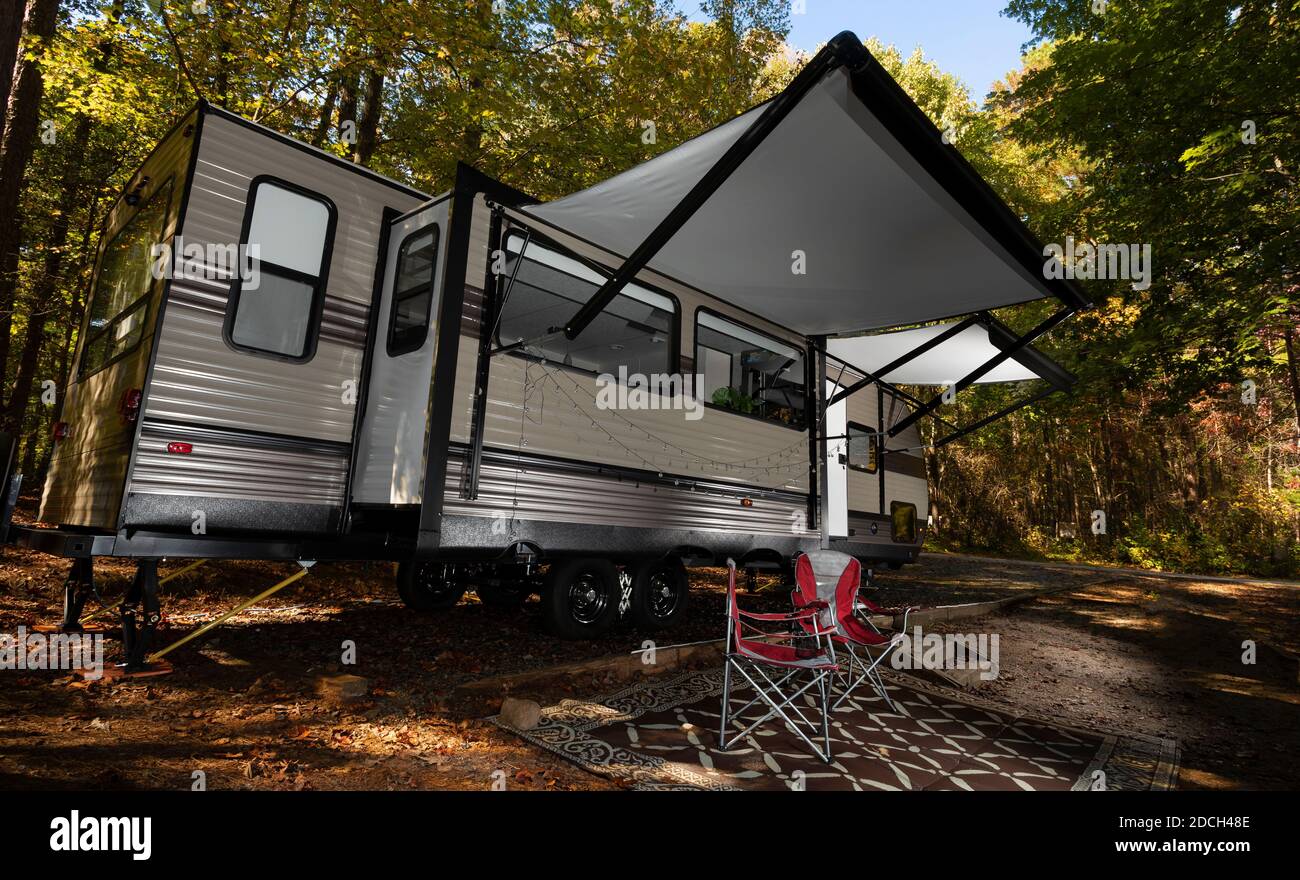 Travel trailer in the daytime during early fall at a Falls Lake ...