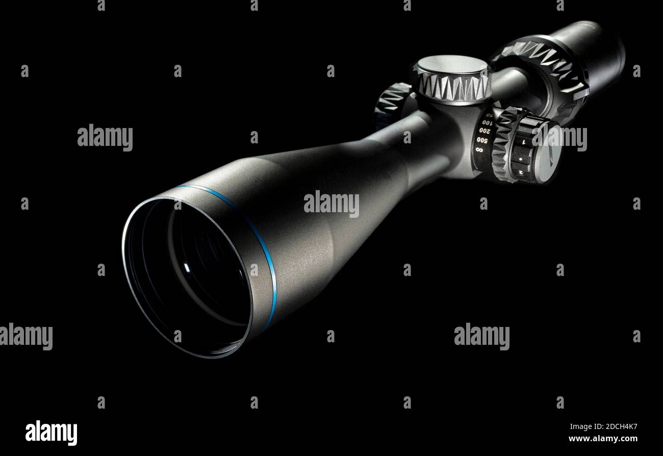 High magnification sniper scope that is on a black background Stock ...