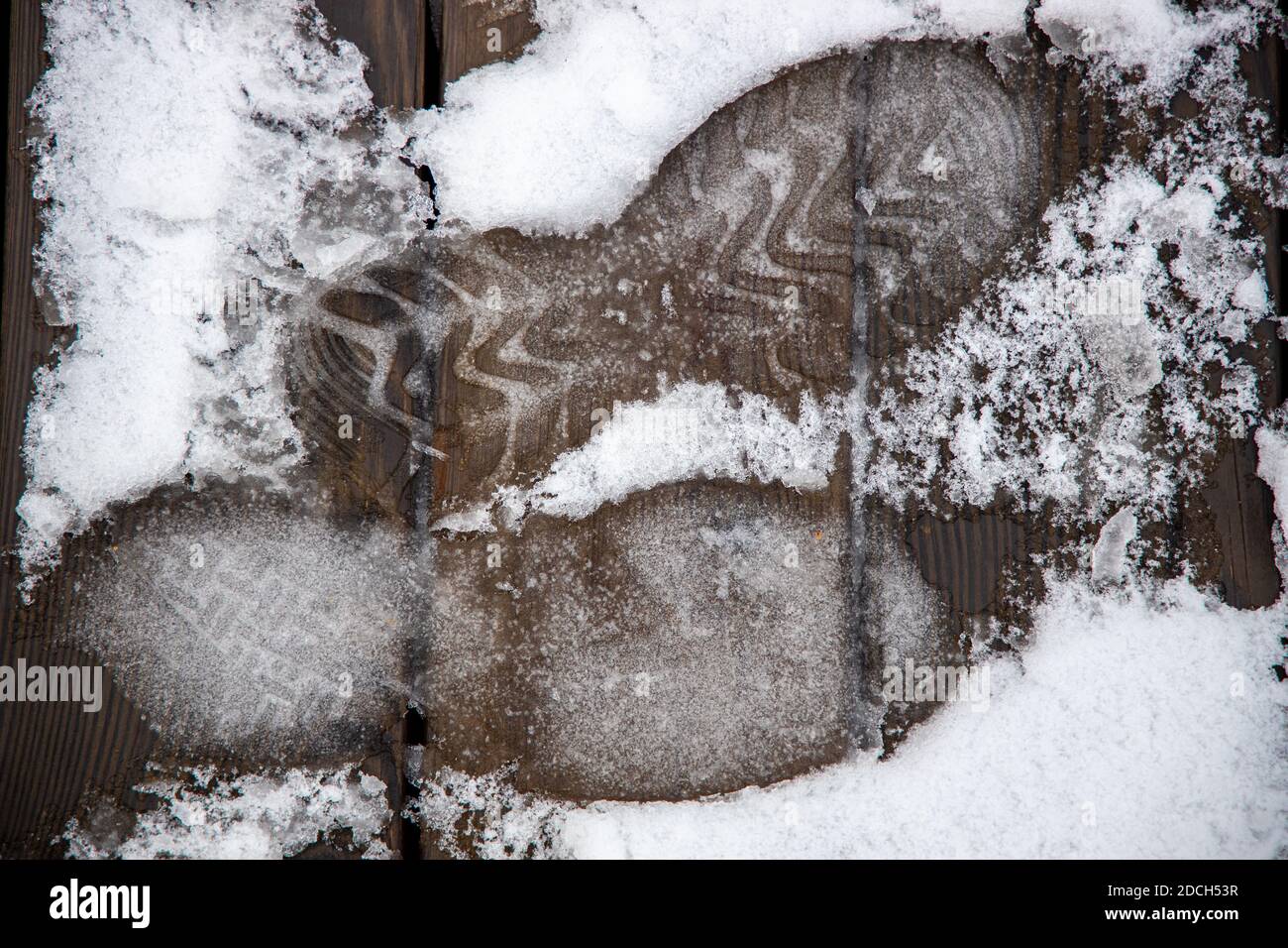 Lots of shoe marks in the snow Stock Photo - Alamy