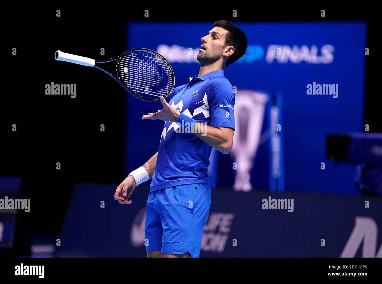 Novak Djokovic reacts during his match against Dominic Thiem during ...