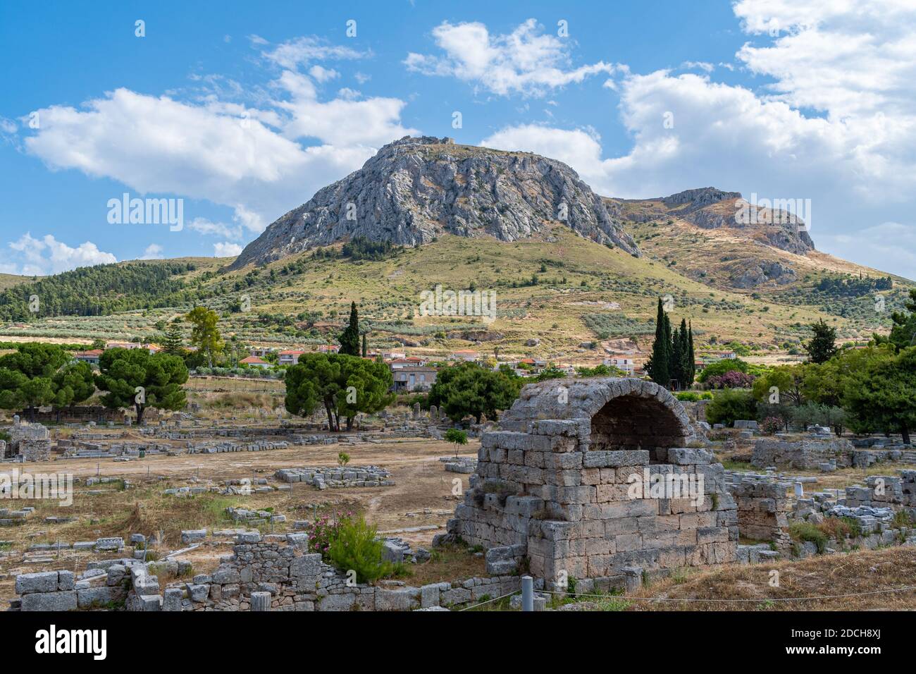 Ancient Corinth with Acrocorinth castle at the background Stock Photo ...