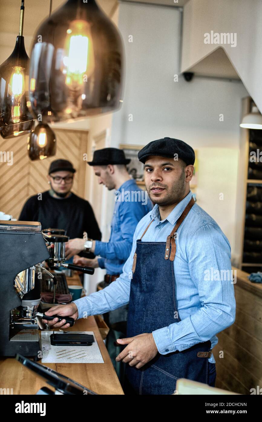 Great Britain / England / London /Coffee Style / Coffee shop owner and ...