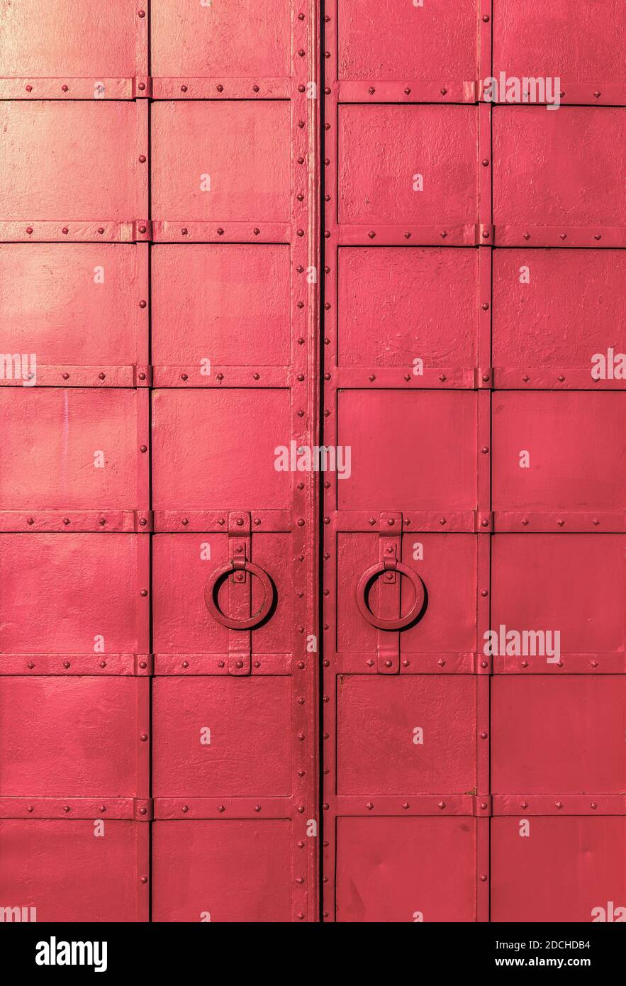 fresh painted old riveted double door Stock Photo - Alamy
