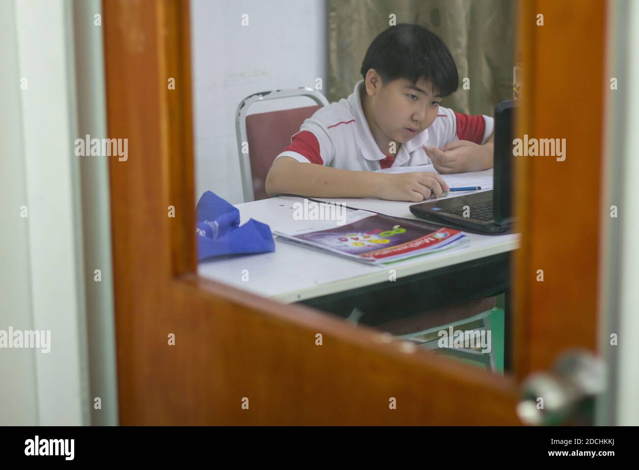 A school boy focus studying Stock Photo - Alamy