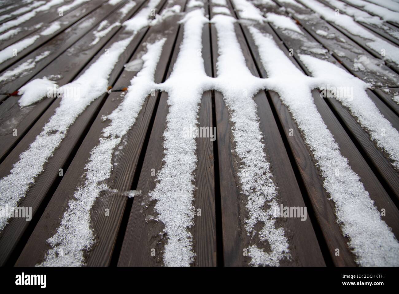 fresh snow on the terrace dark board Stock Photo - Alamy