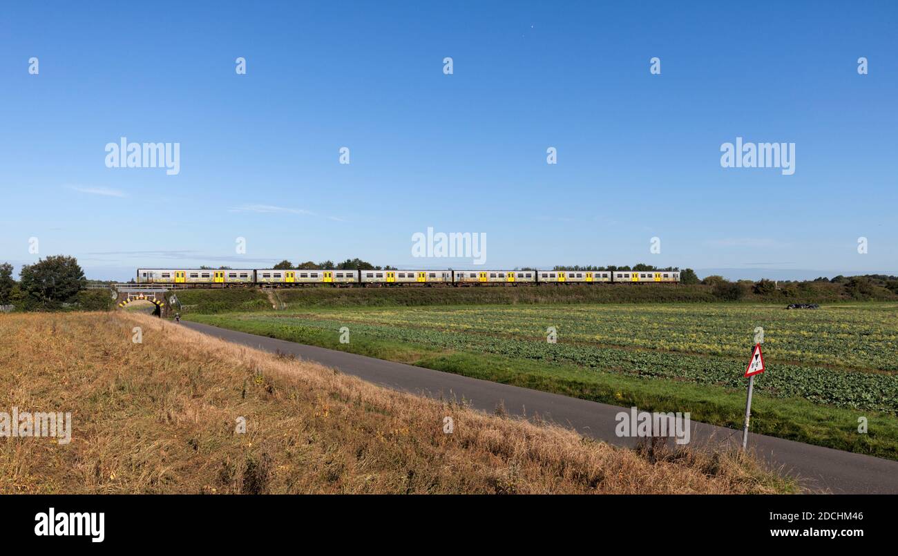 Merseyrail Electrics train passing Bowkers Green (south of Town Green ...