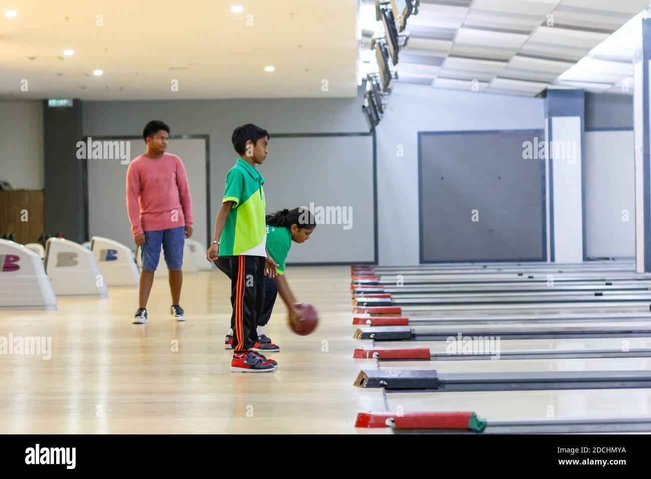 School children playing bowling Stock Photo - Alamy