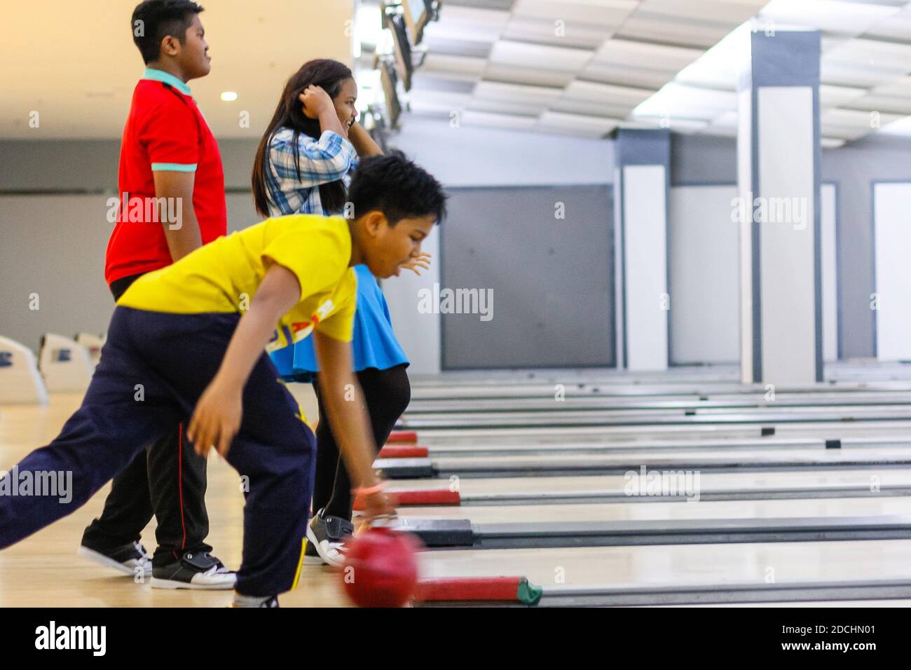 School children playing bowling Stock Photo - Alamy