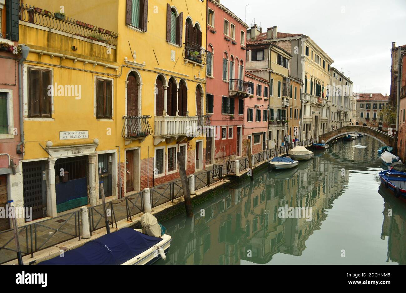 Venice canals with charming buildings and winding walkways with bridges ...
