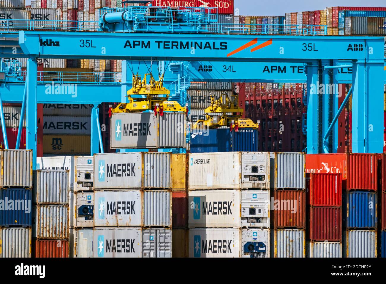 Shipping containers are moved in the APM Terminal in the new Maasvlakte ...