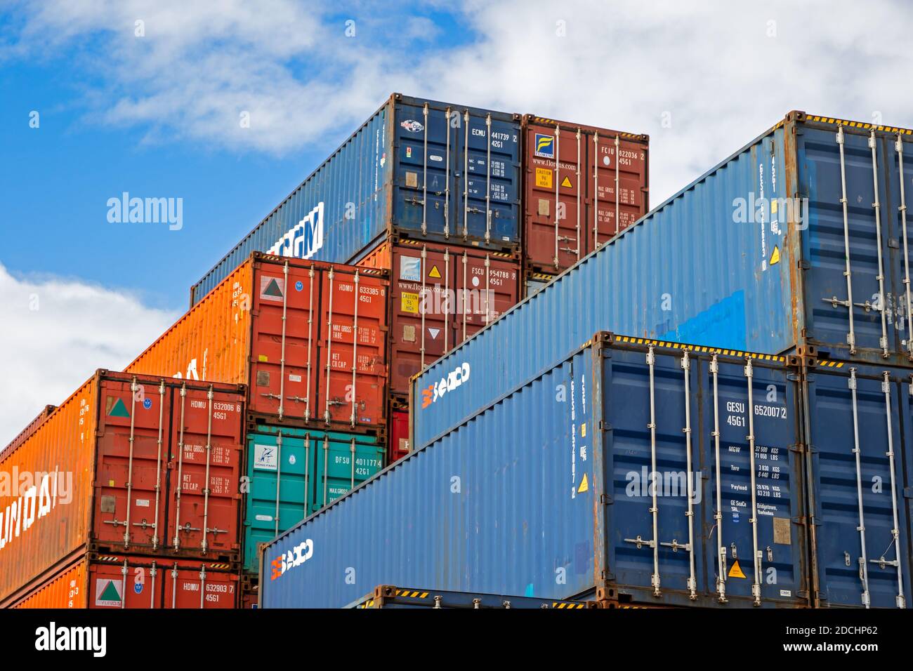 Shipping containers stacked at a container terminal in the Port of ...