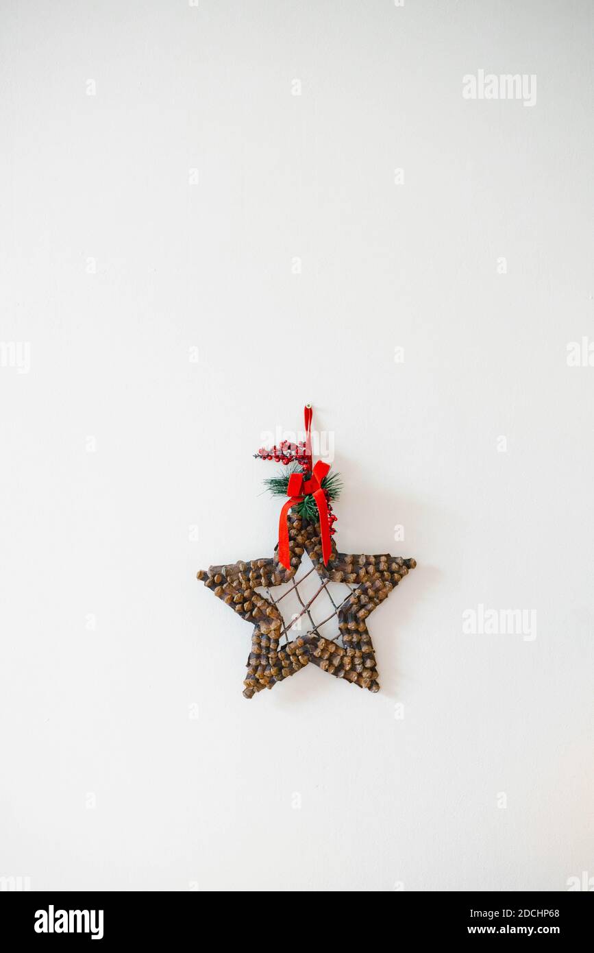 Homemade Christmas star wreath on white background with copy space ...