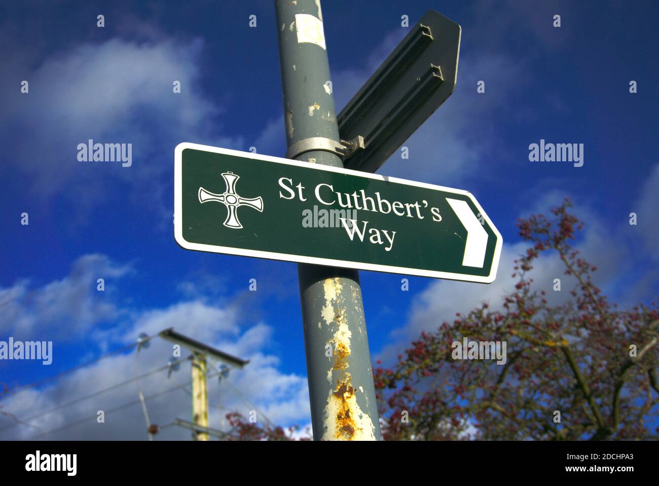 Metal sign on slightly rusty post indicating St Cuthbert's Way in the ...