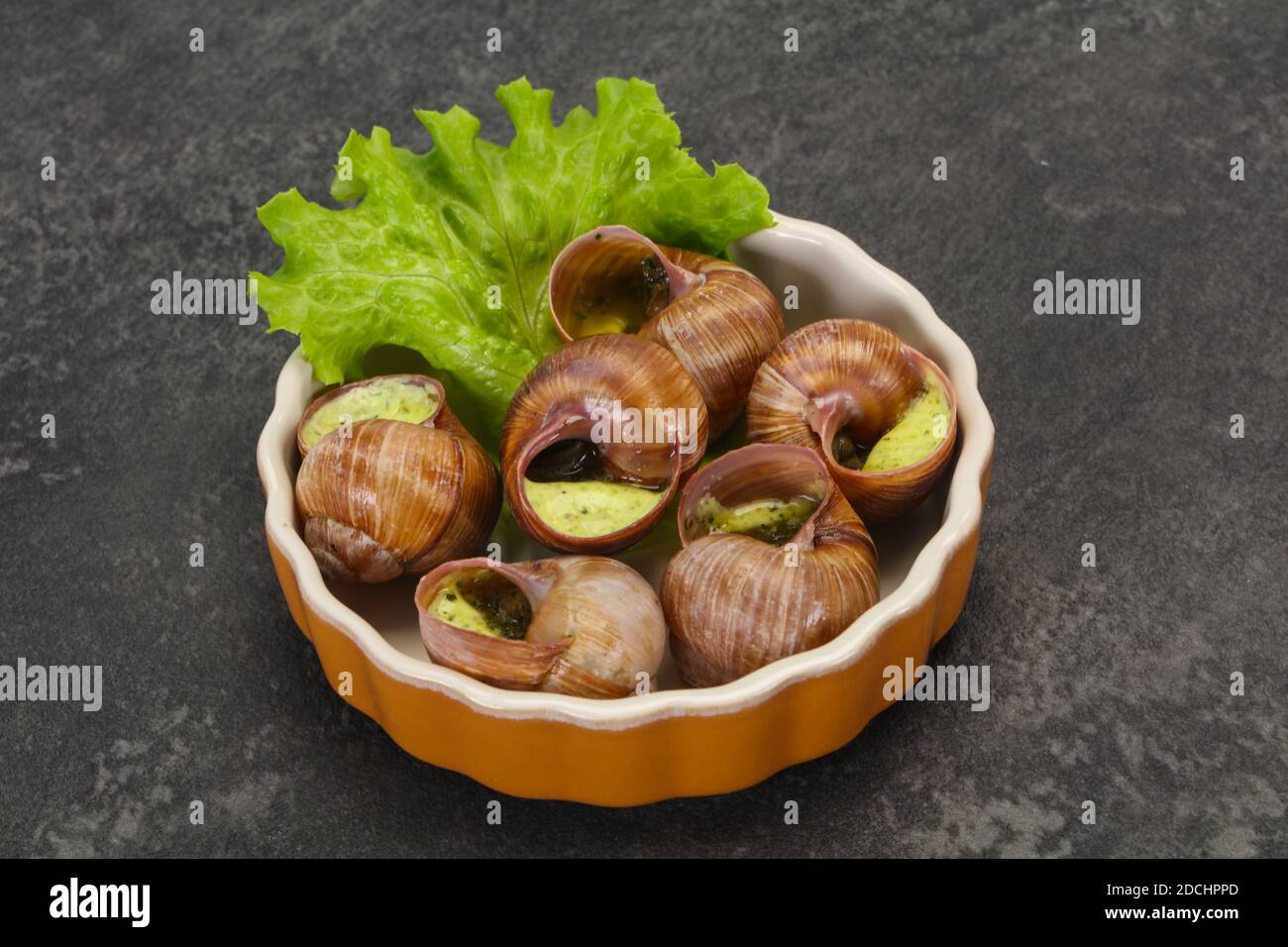 French cuisine - Escargot with butter sauce Stock Photo - Alamy