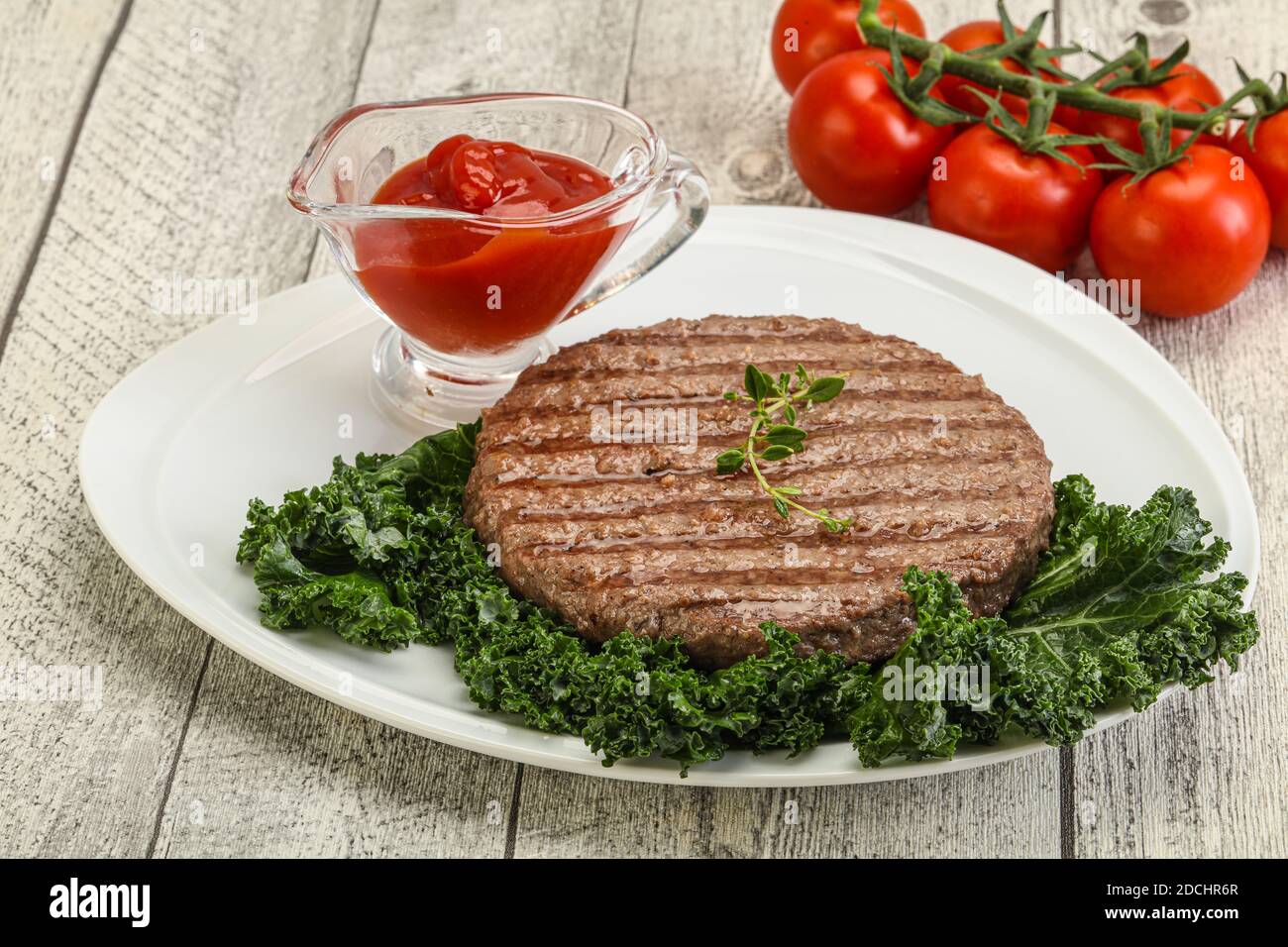 Grilled tasty beef cutlet for burger Stock Photo - Alamy