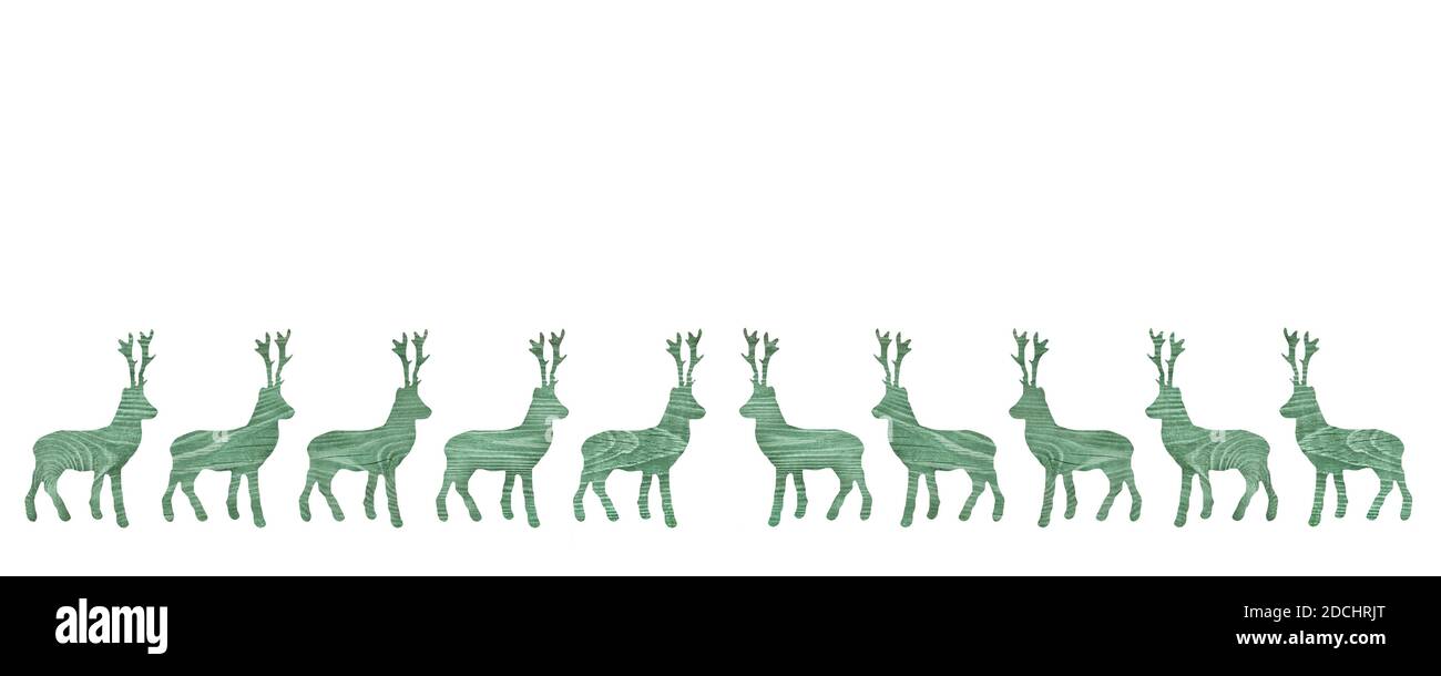 Ten green wooden reindeers isolated on white Stock Photo - Alamy