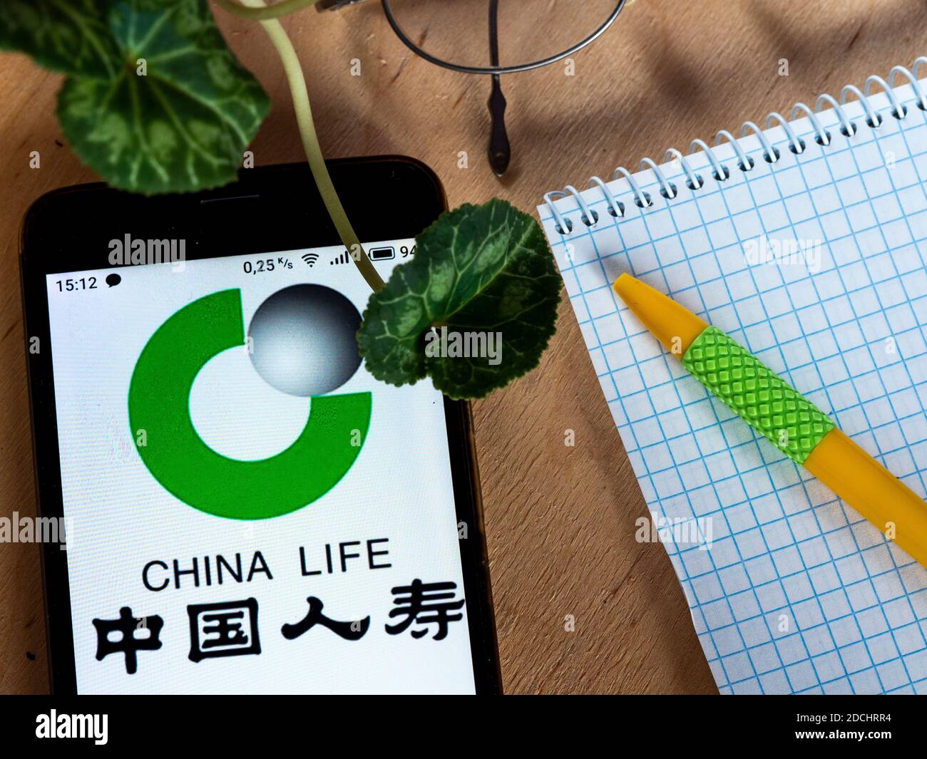 In this photo illustration a China Life Insurance logo seen displayed ...