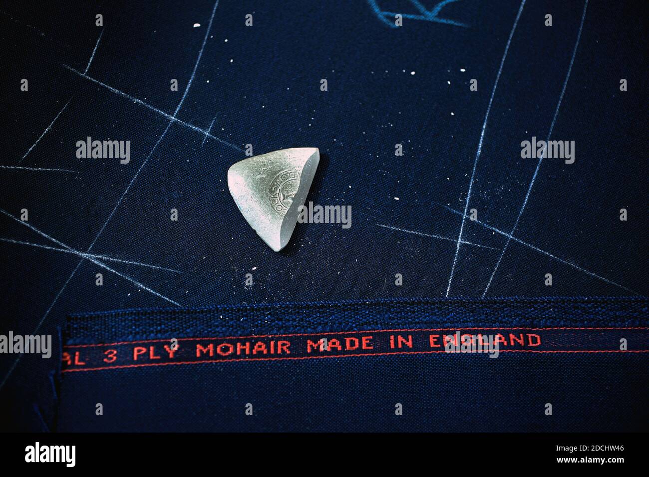 close up view of markings on cloth .chalk markings of the pattern ...