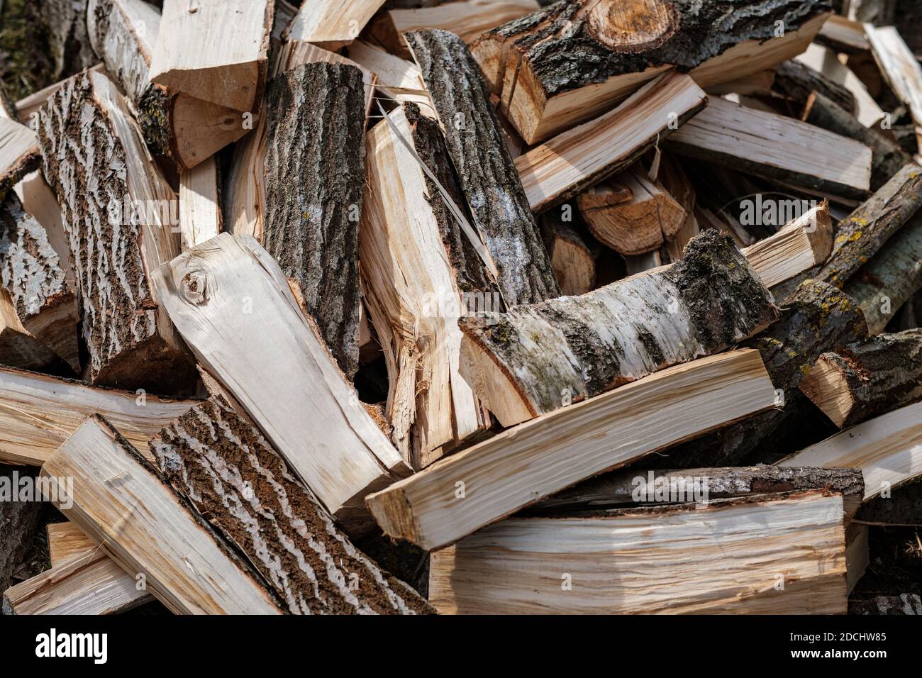firewood log texture in nature. wood chaos pattern Stock Photo - Alamy