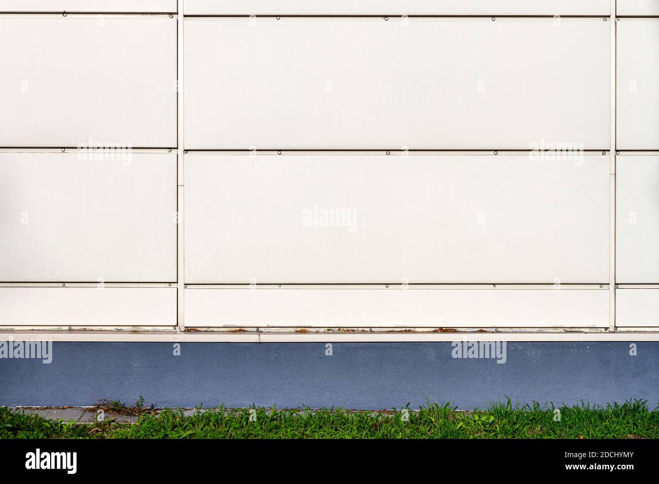 White color industrial warehouse wall. Urban background Stock Photo - Alamy