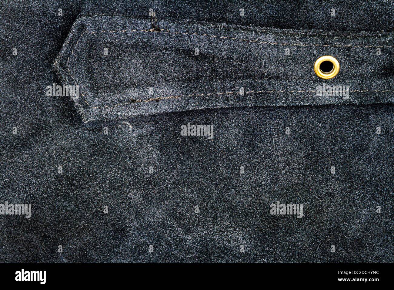 Genuine blue suede texture with a belt. Abstract vintage natural ...