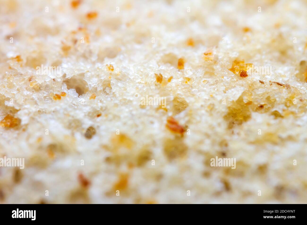 Extreme closeup of a delicious white bread texture. Shallow deph of ...