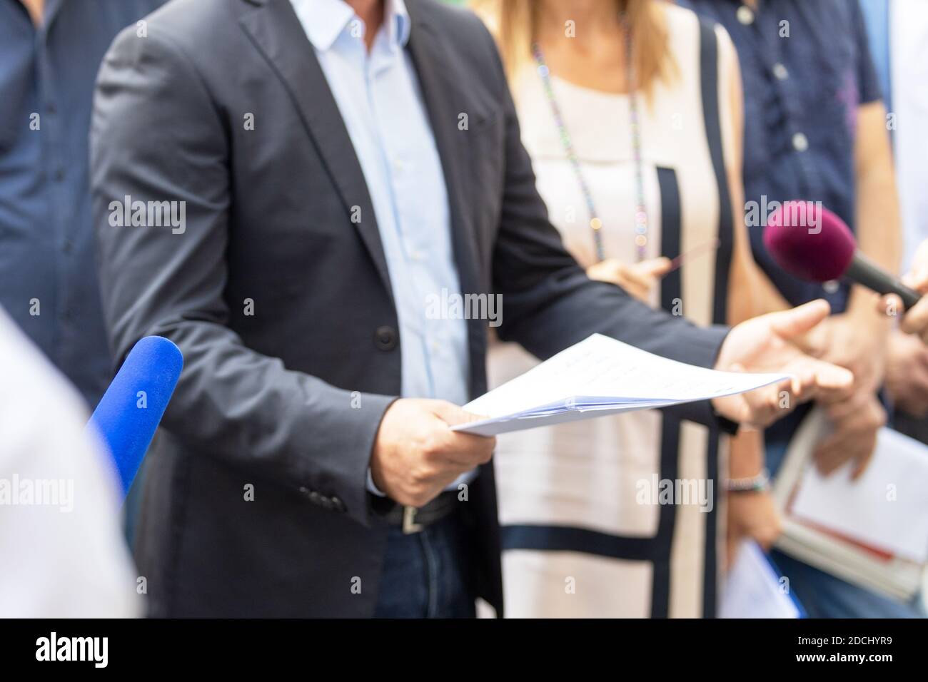 Whistleblower is giving a speech at press conference or media event ...