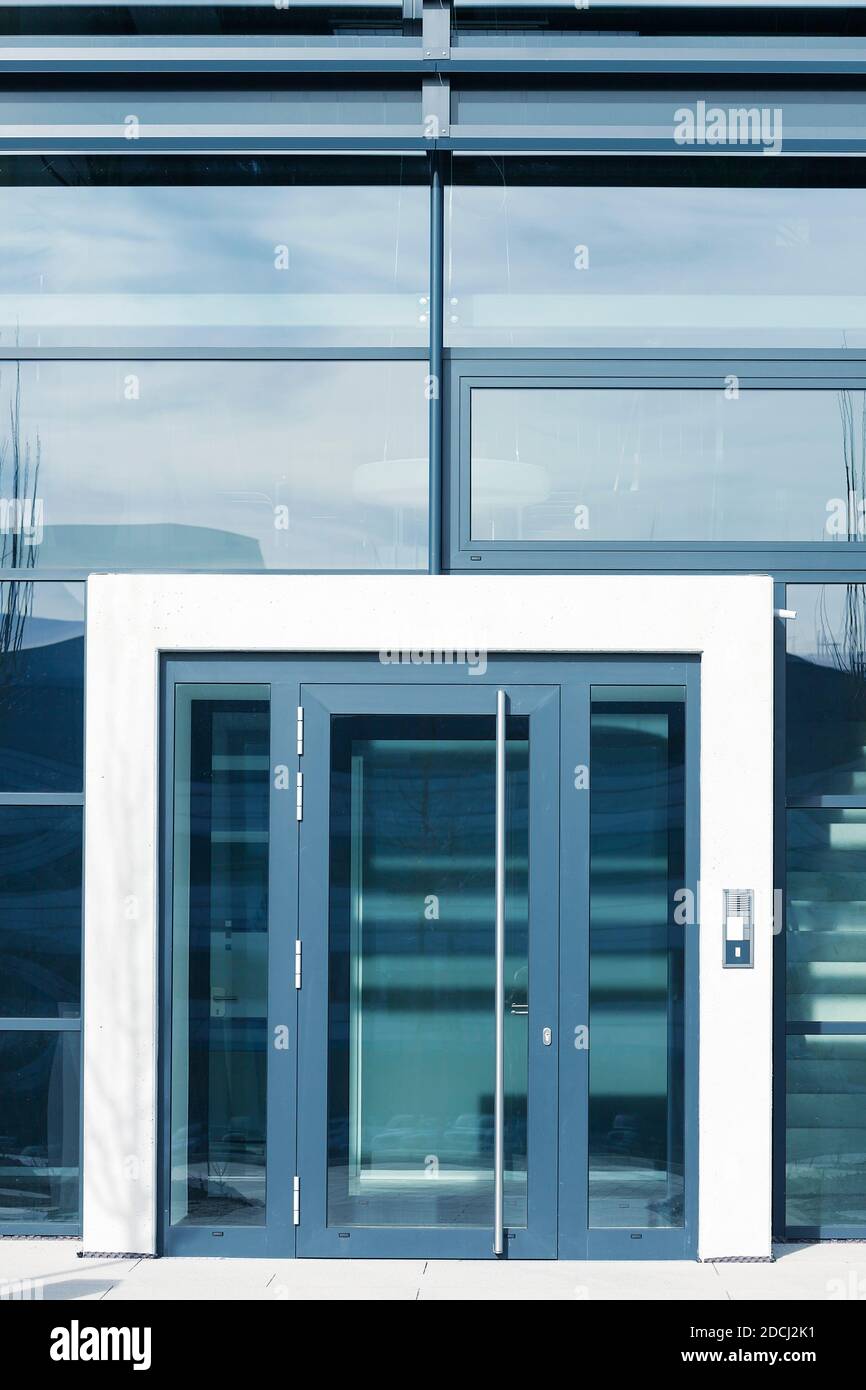 Modern Glass Building, Entrance, Blue Toned Image Stock Photo - Alamy