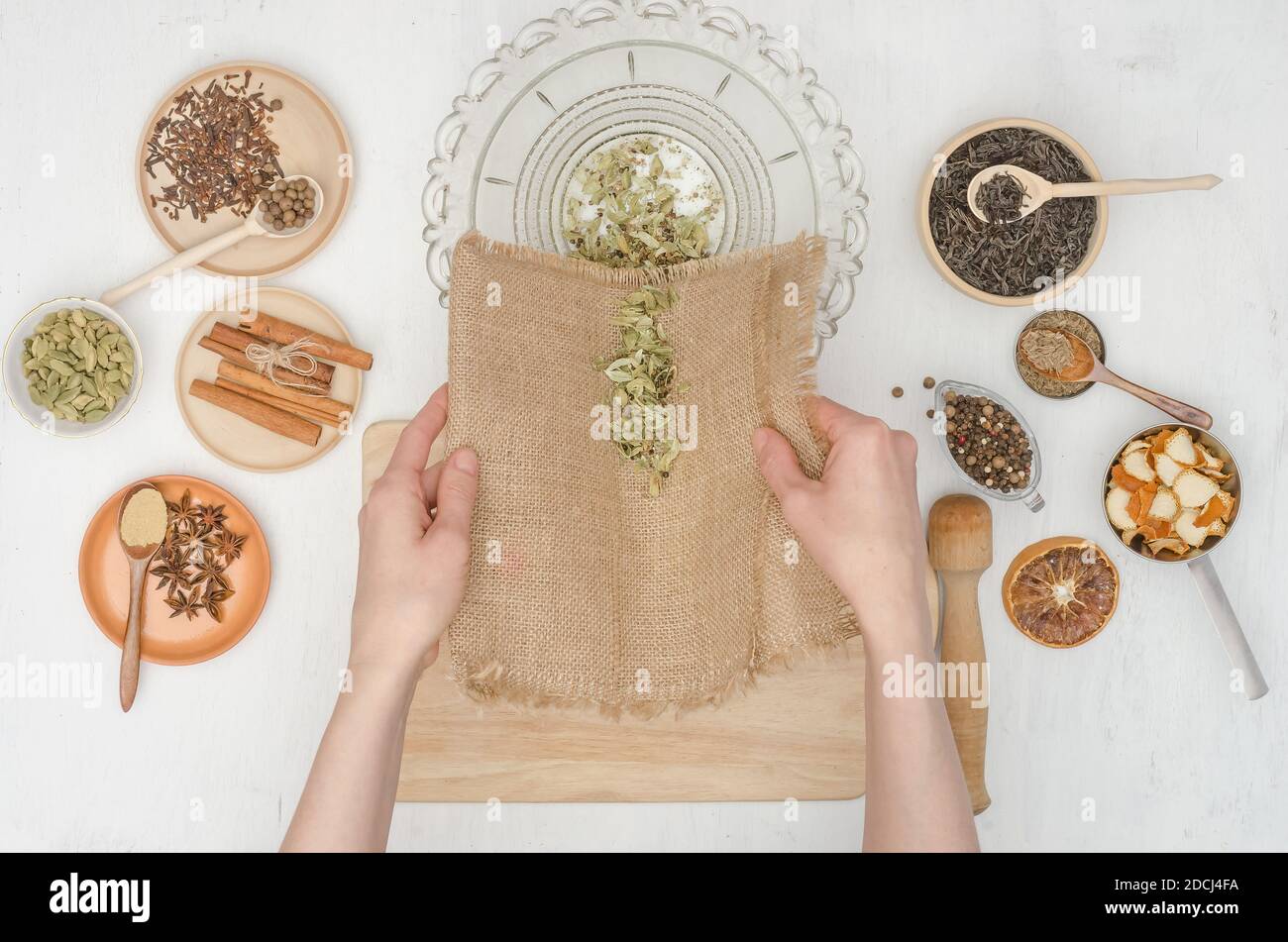 Step by step preparation of Indian masala tea with spices. Step 4- pour ...