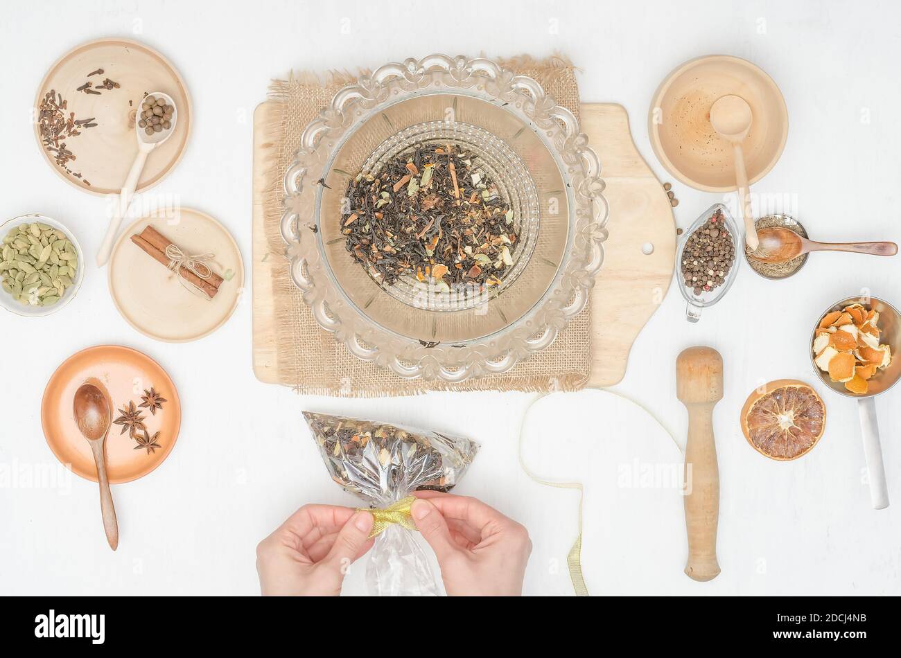 Step by step preparation of Indian masala tea with spices. Step 23- tie ...