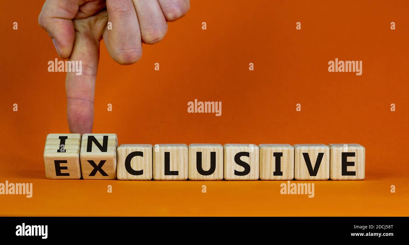 Symbol for a better inclusion. Male hand turns cubes and changes word ...