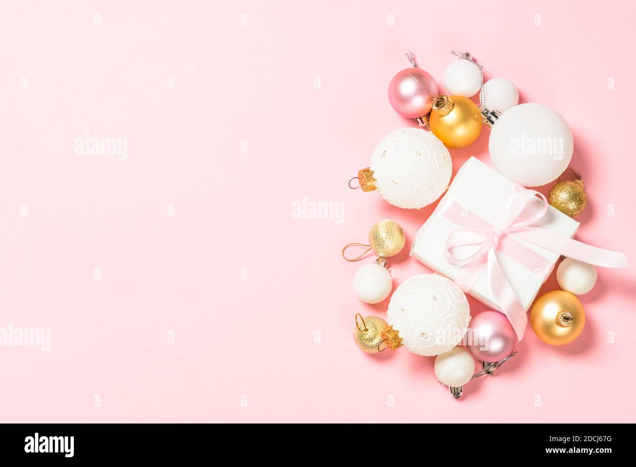 Christmas pink flat lay background with holiday decorations Stock Photo ...