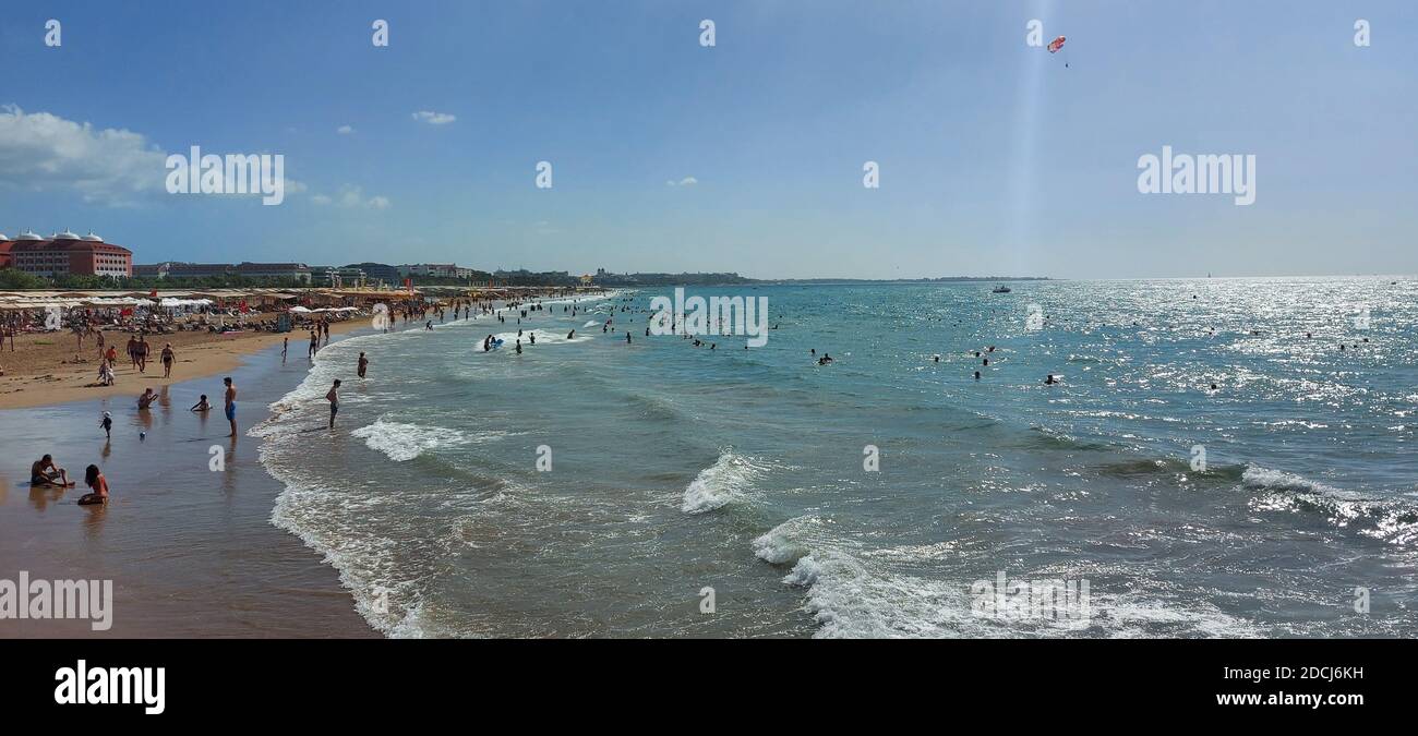 People on the beach and the beautiful sea Stock Photo - Alamy