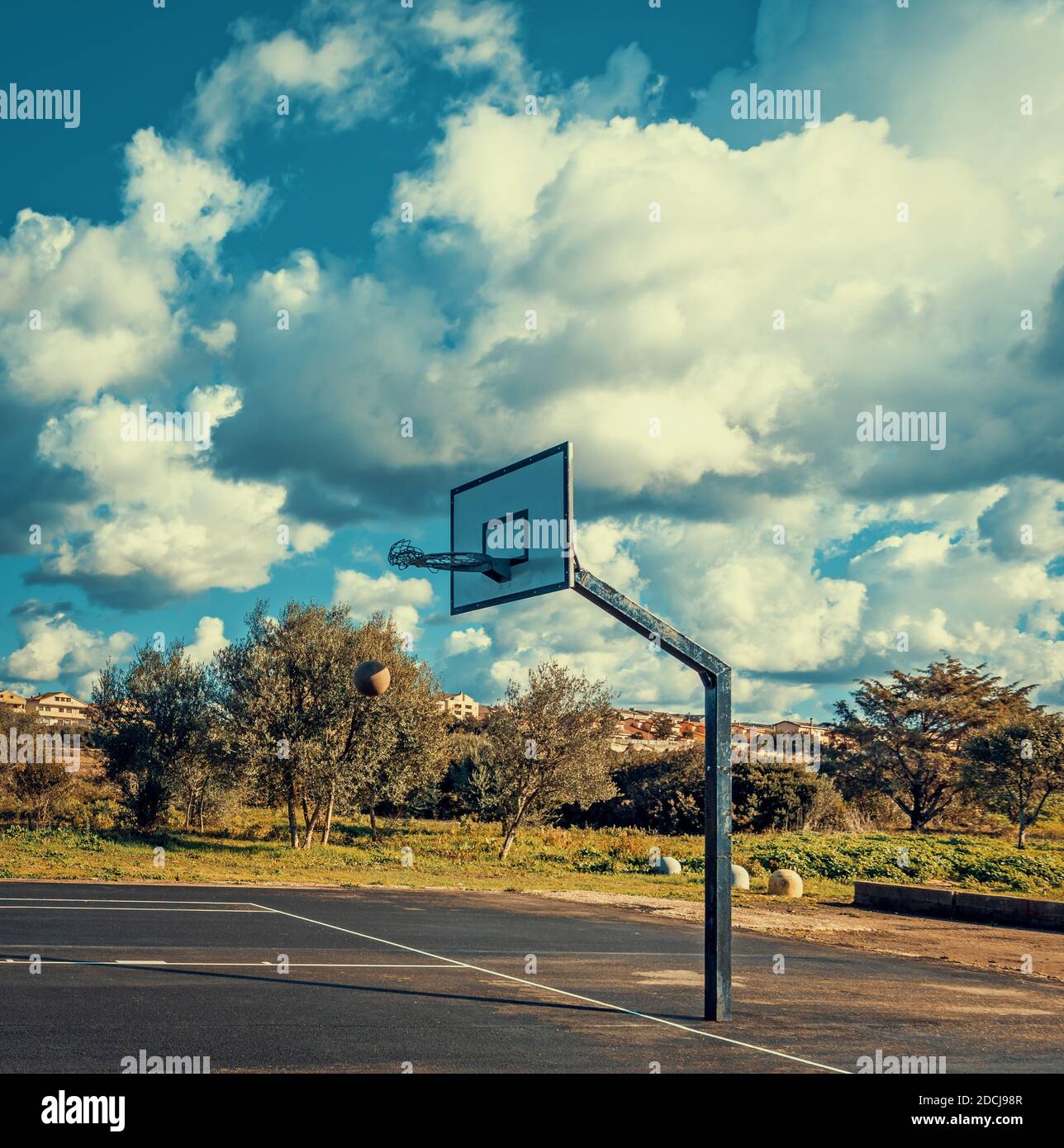 Hoop net sways after the ball goes through the rim in a basketball ...