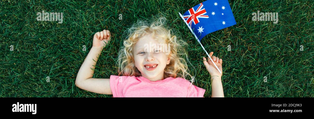 Adorable cute happy Caucasian girl holding Australian flag. Smiling ...