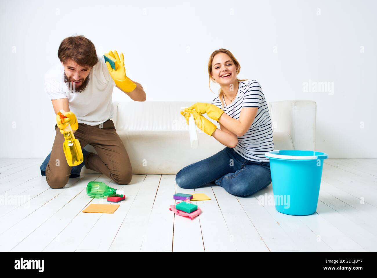 Man and woman housekeeping service interior lifestyle Stock Photo - Alamy