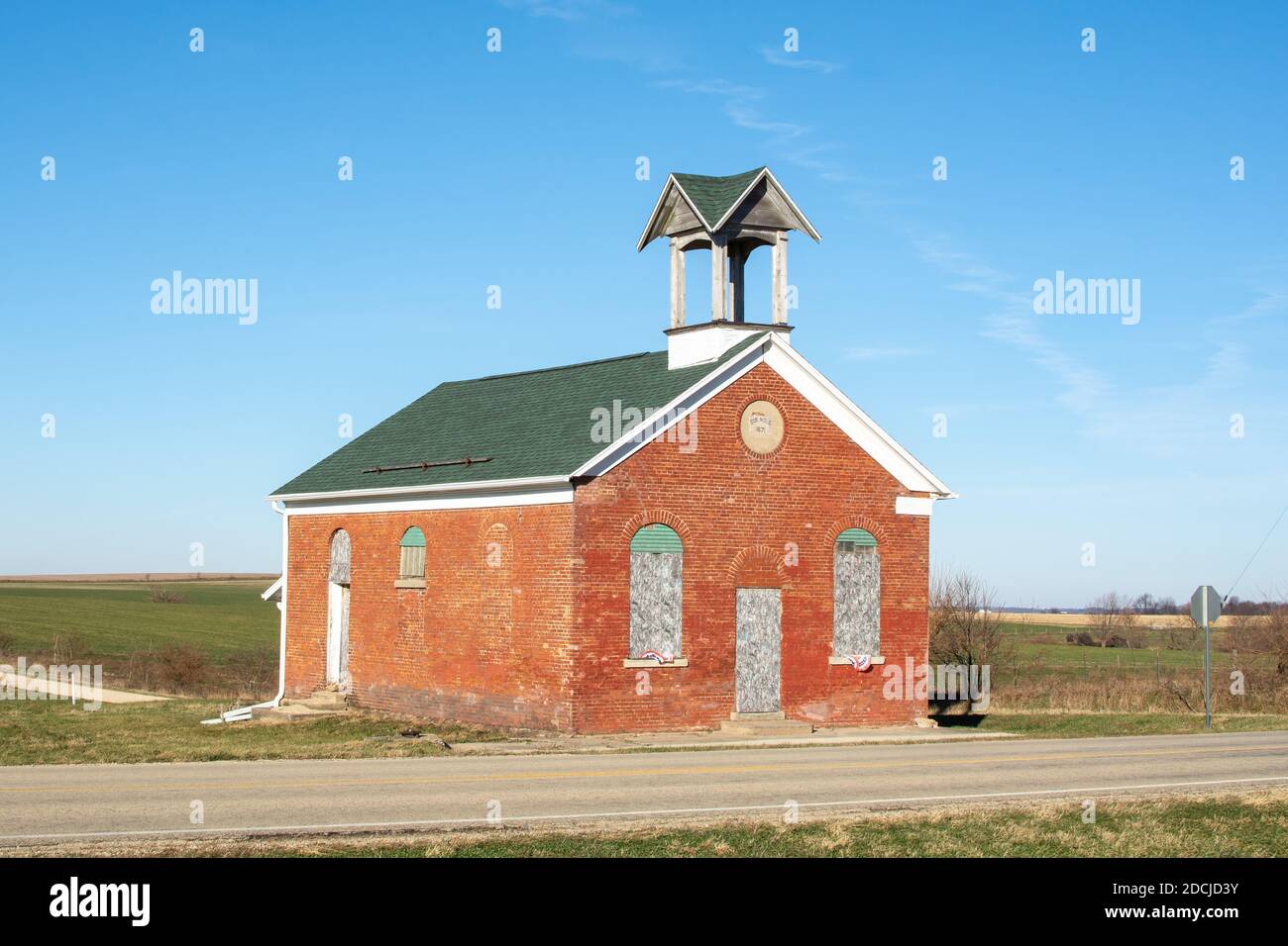 Old one room schoolhouse with farm fields behind. German Valley ...