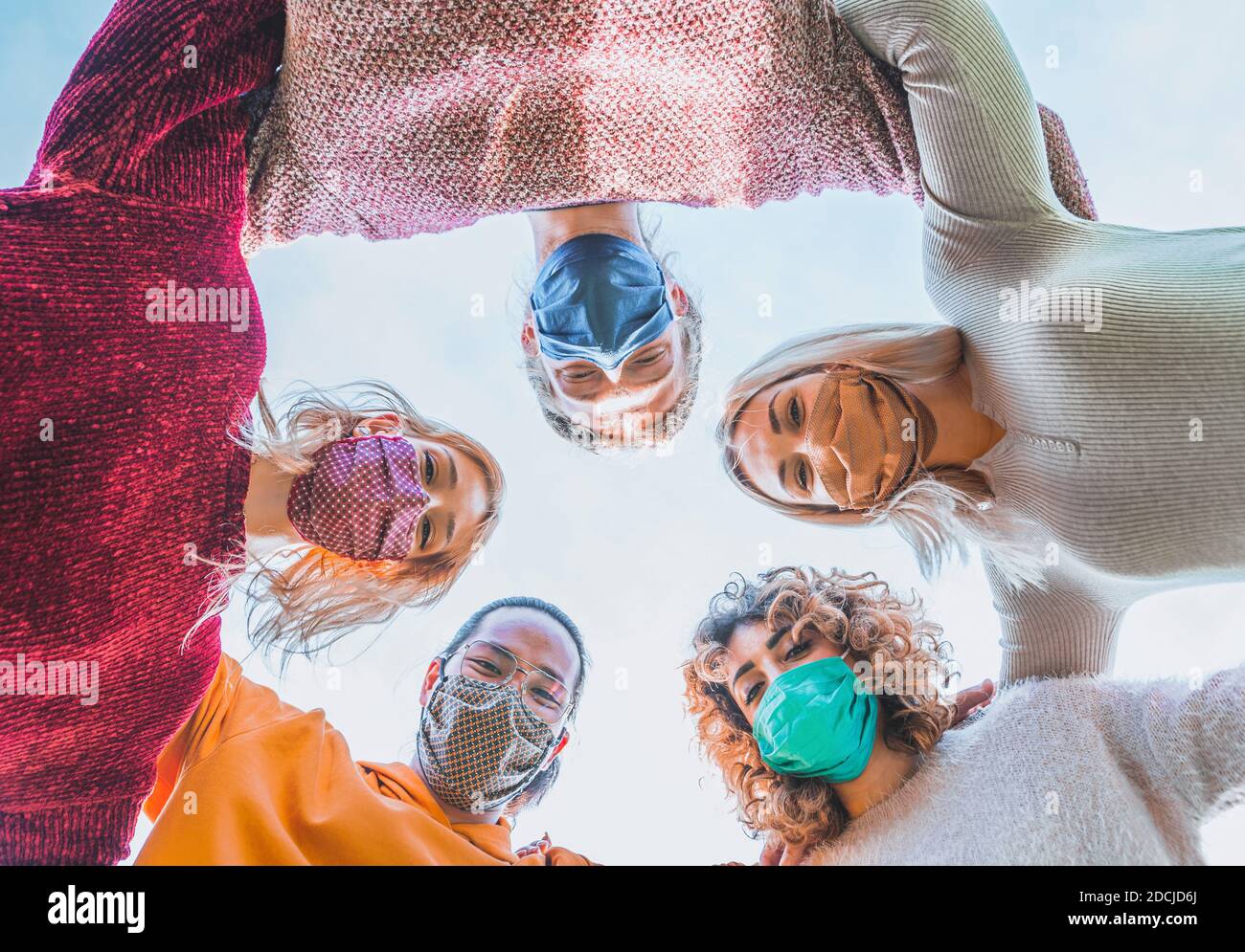 Diverse group of students wearing mask hi-res stock photography and ...